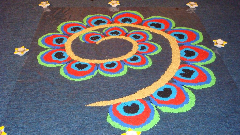 20 Exquisite Diwali Rangoli Designs (Using Flowers, Diyas and Papercraft)