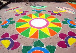 20 Exquisite Diwali Rangoli Designs (Using Flowers, Diyas and Papercraft)
